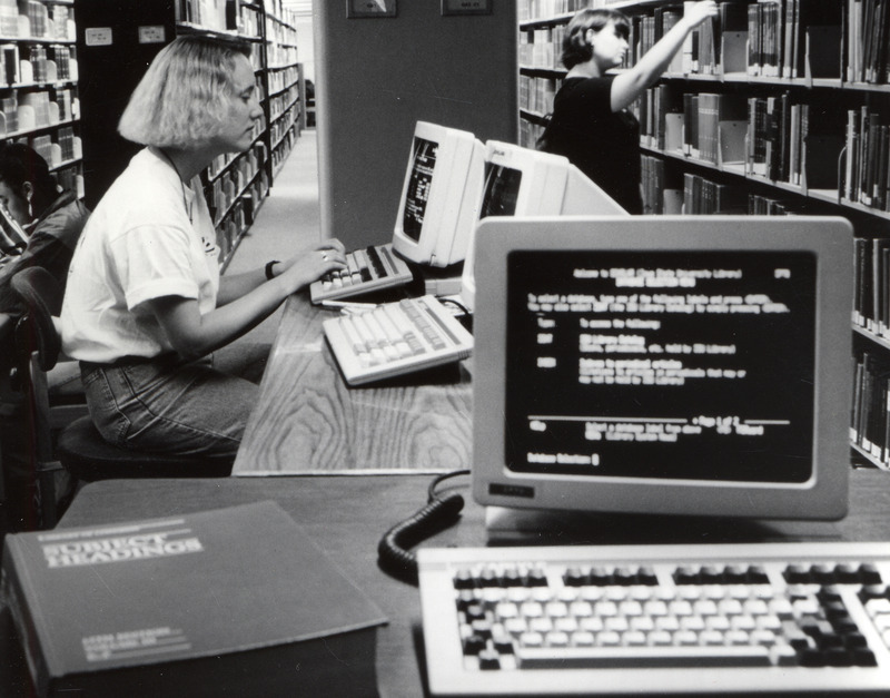 Student using early library computer | Iowa State University Photographs